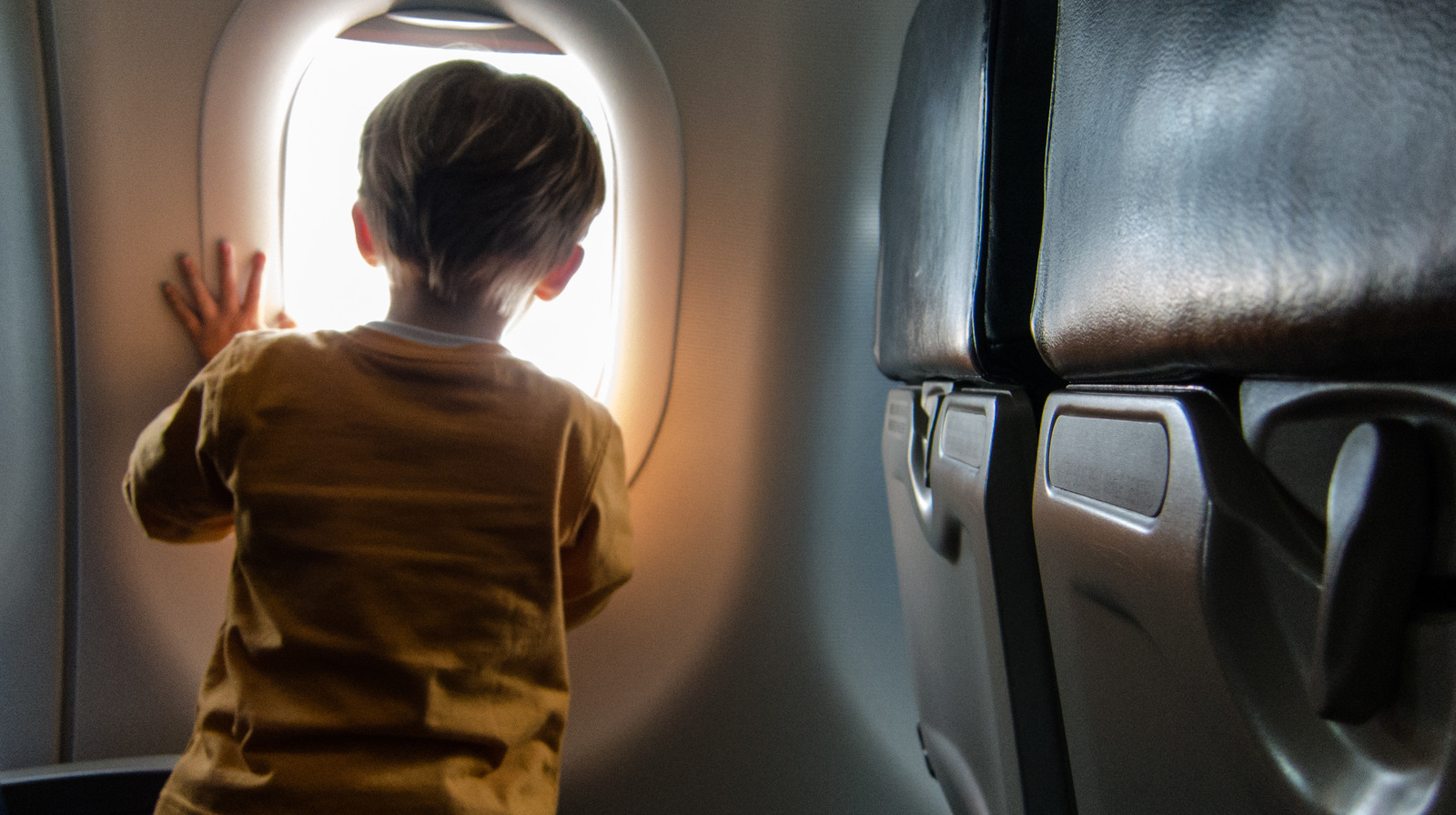 A TikTok Mom's 'Hack' For Extra Space On A Plane Caused A Fiery Stir On ...
