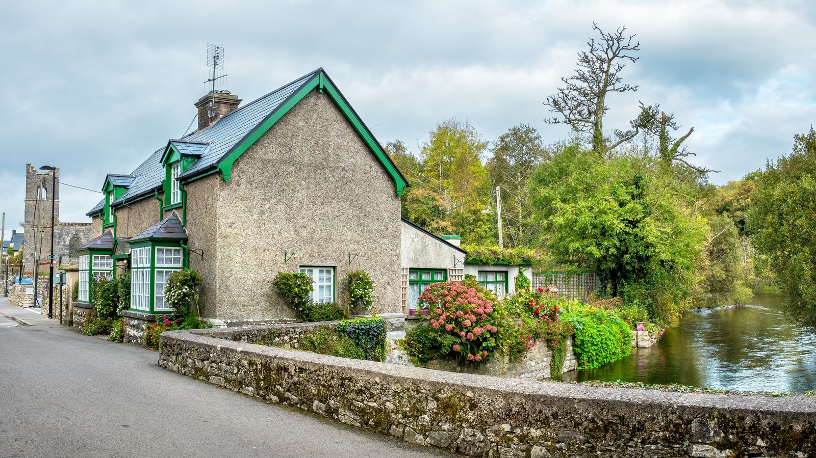 An Irish Village With Thatched Cottages Offers Horseback Rides Along ...