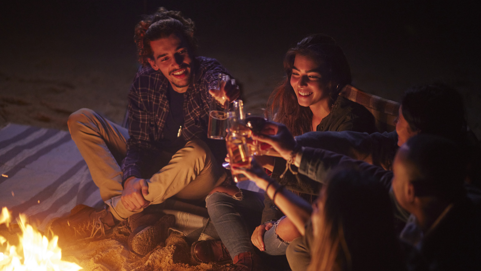 The Alcoholic Beverage That'll Keep Bugs Away While Camping