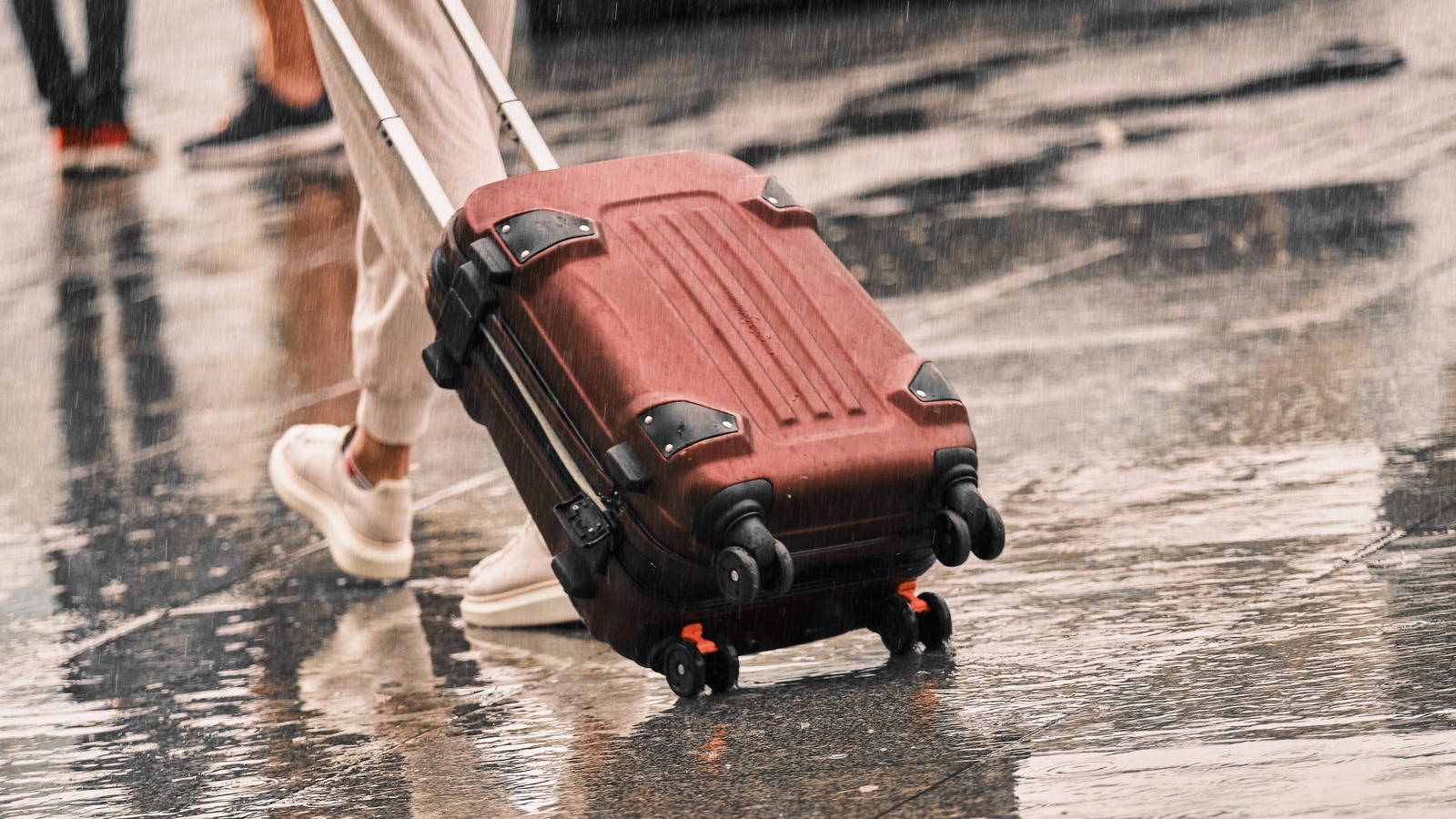 The Genius Hack For Waterproofing Your Luggage