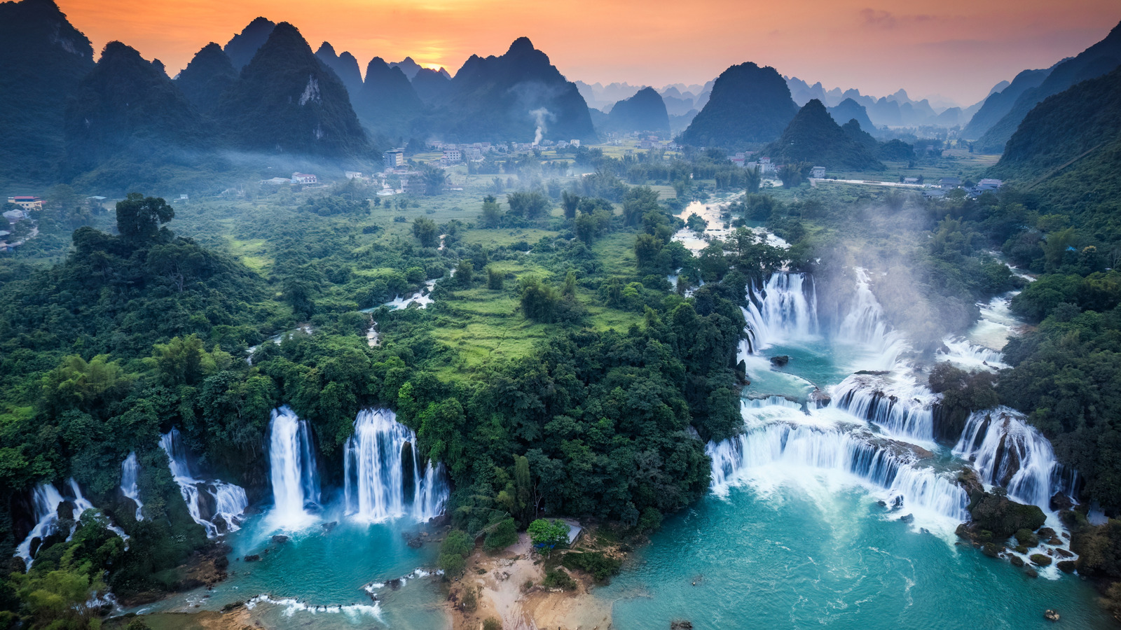 The Massive Waterfall That Connects Two Asian Countries With Roaring Beauty
