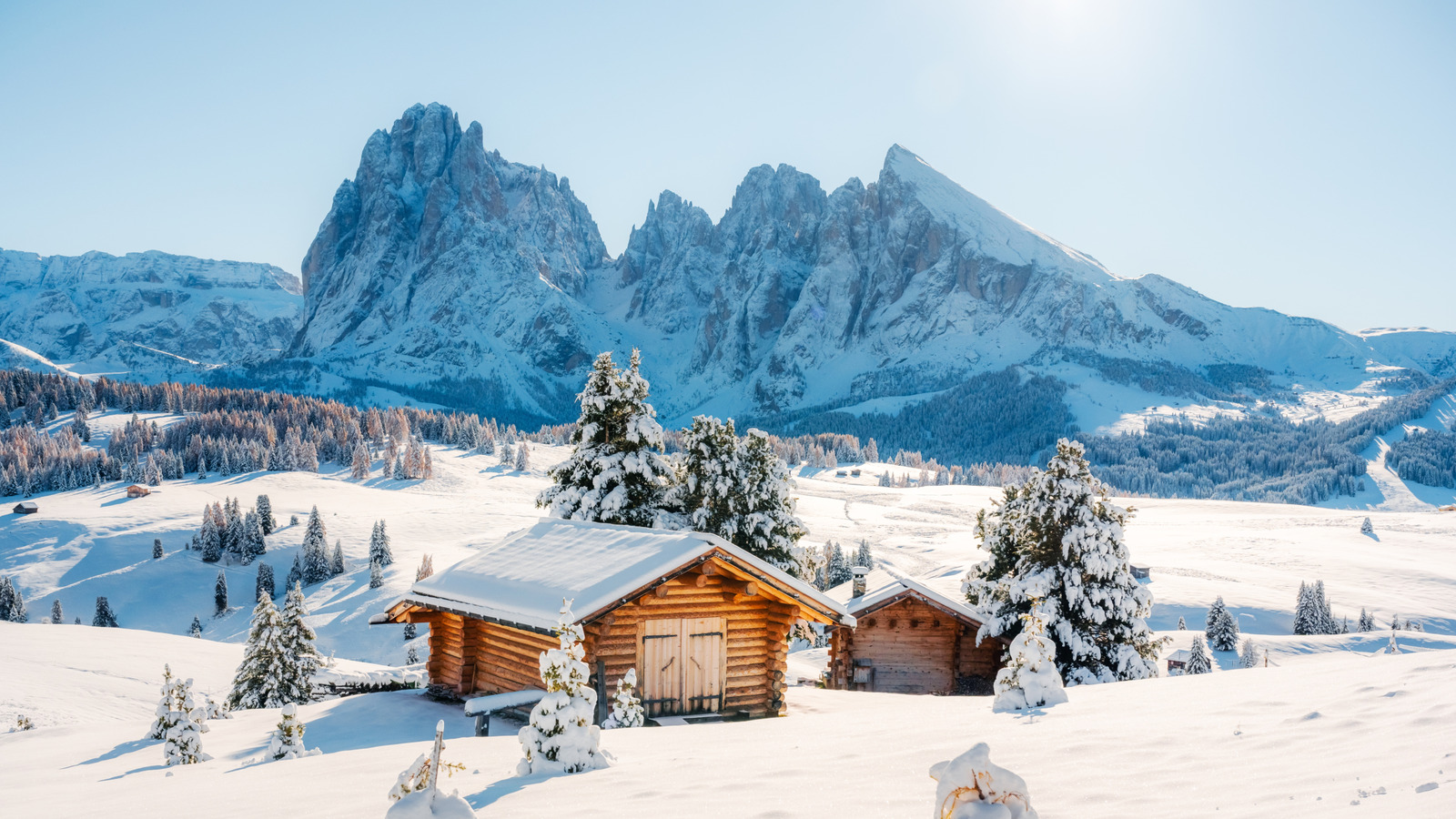 The Serene Mountain Village In Italy With Snow-Capped Peaks And ...