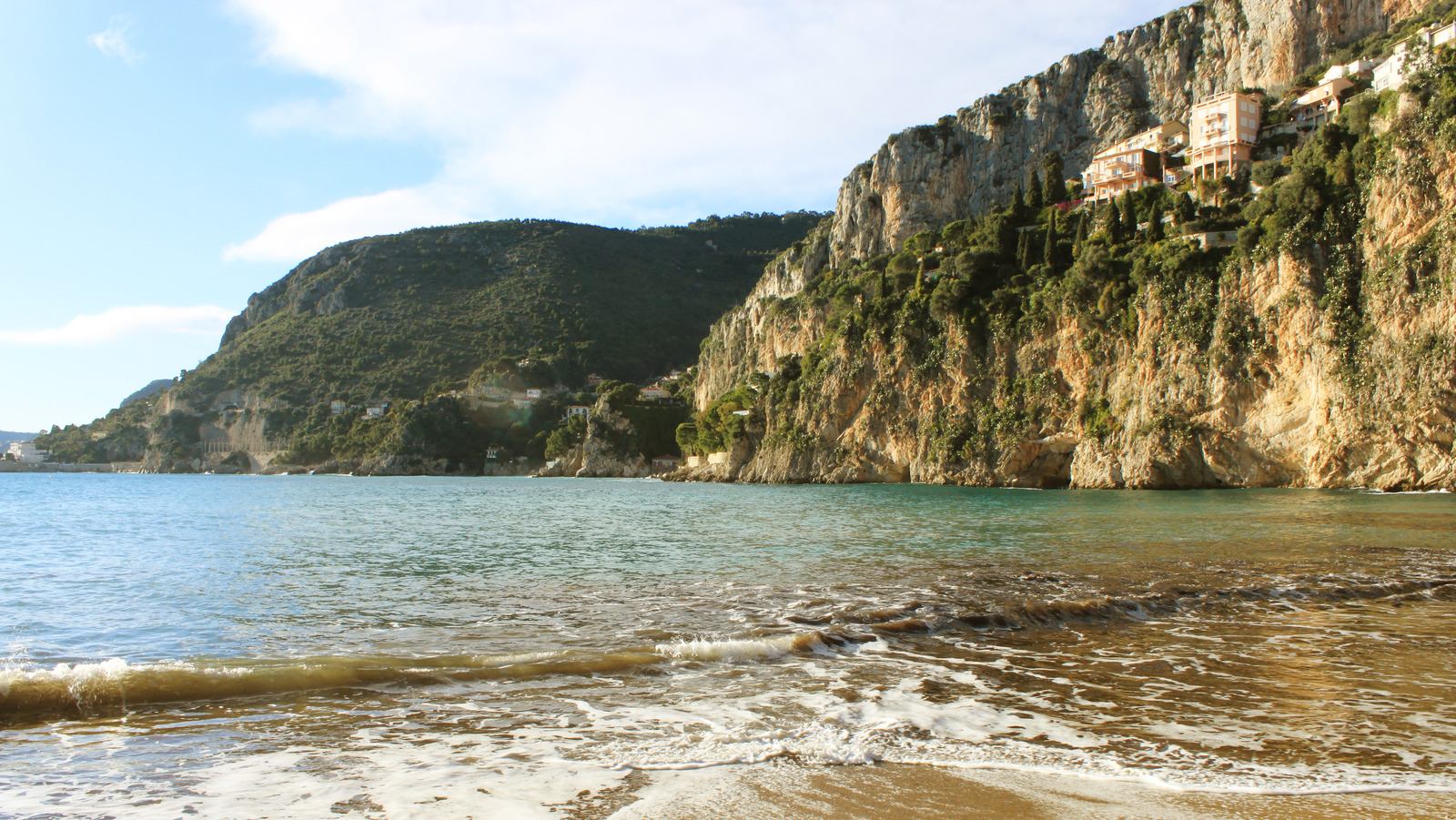 This Secret Beach Is France's Own Little Corner Of Paradise With Vibrant Cliffside Views