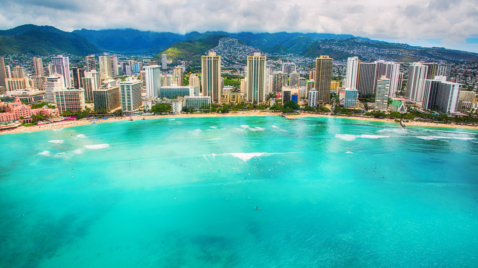 Walk Right To One Of Hawaii's Best Beaches From This Vibrant Luxury Resort